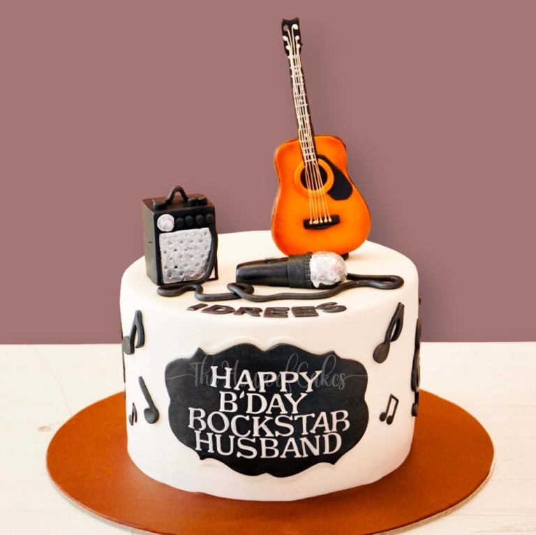 Delightful Rock Star Cake with Guitar for Special Occasions