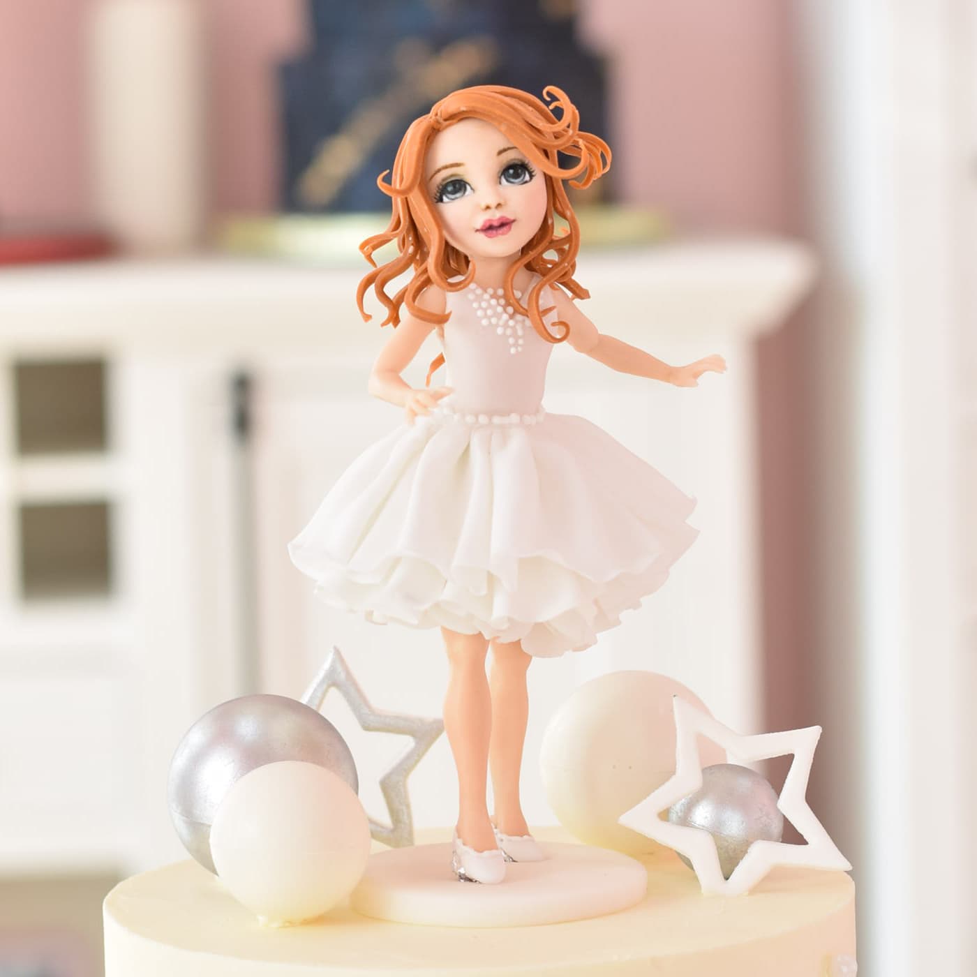 Cute girl cake with customised sugar figure - The House of Cakes Dubai