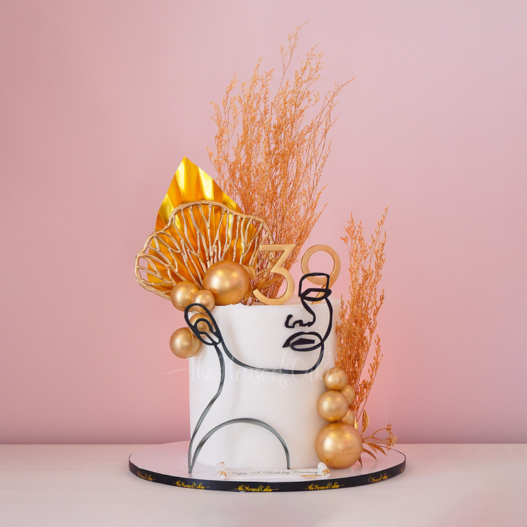 Woman abstract face cake - The House of Cakes Dubai