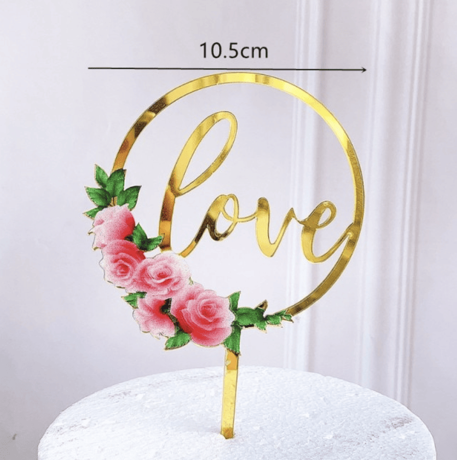 LOVE gold cake topper with pink flowers - The House of Cakes Dubai