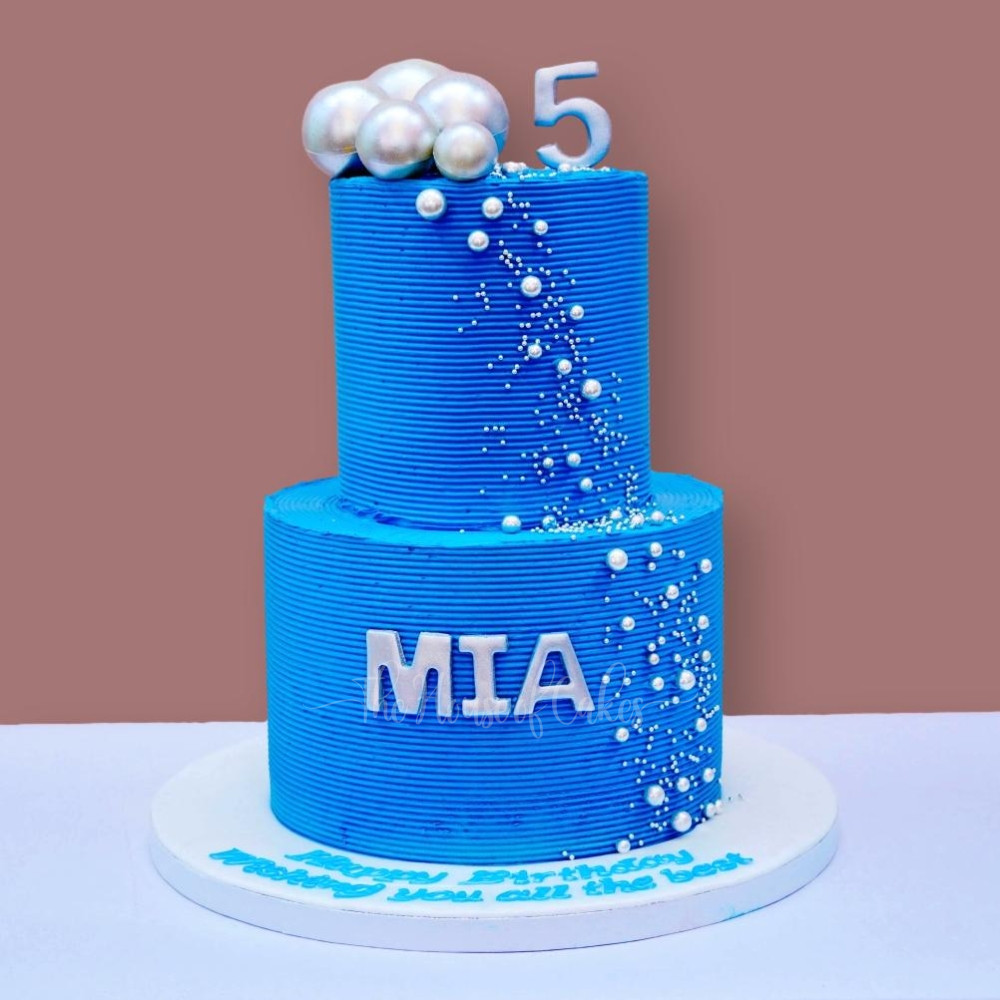Elegant and simple blue birthday cake - The House of Cakes Dubai